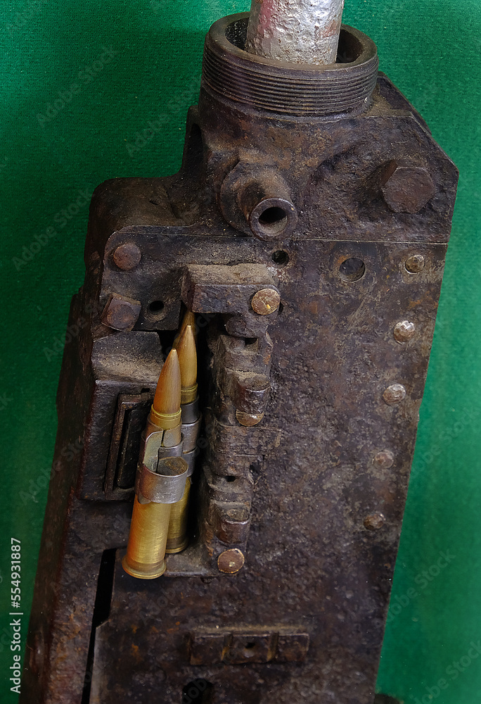 Rusted section of world war two aircraft mounted machine gun with some ...