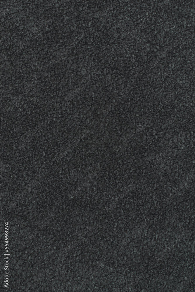 The texture and background of the upholstery fabric is dark gray ...