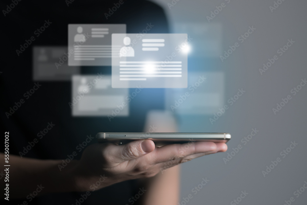 Managers`s hand pointing on highlighted cv cards with candidates ...