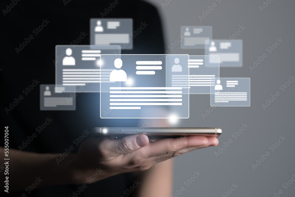 Managers`s hand pointing on highlighted cv cards with candidates ...