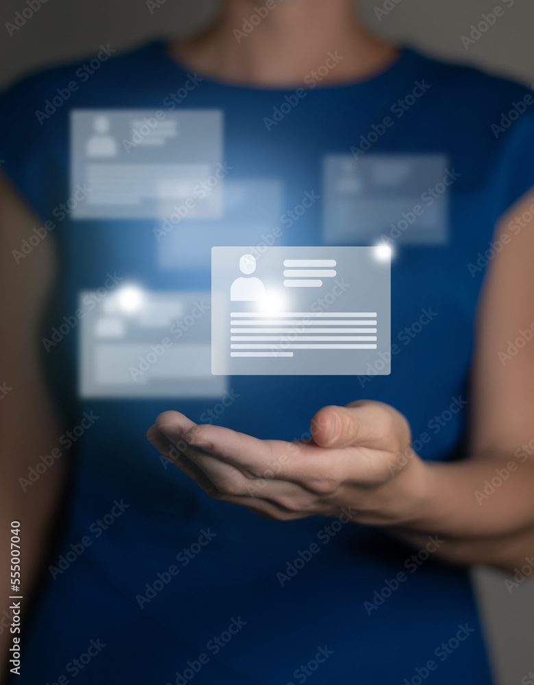 Managers`s hand pointing on highlighted cv cards with candidates ...