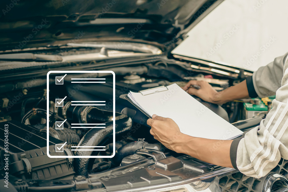 Auto mechanic checking car engine checking for engine repair, auto ...