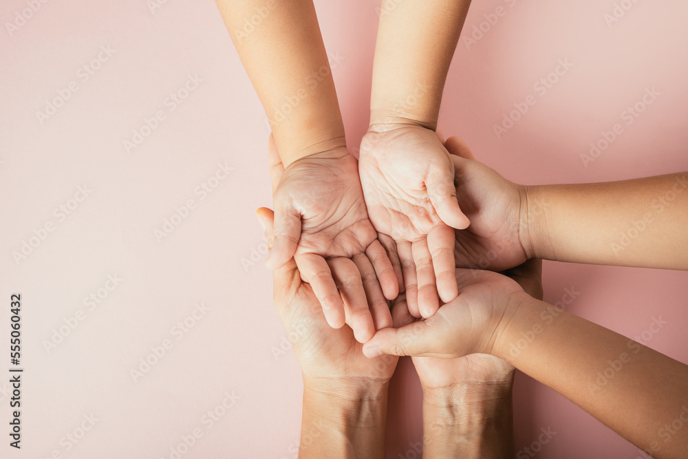 Close up hands children on adult mother hand, Top view person kid stack ...