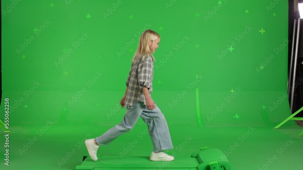 happy Caucasian child walking on a Green Screen, Chroma Key. 4k UHD ...