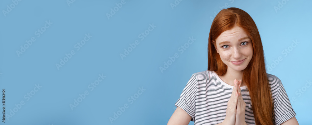 Cute girl acting kind angel gazing camera silly smiling asking please ...