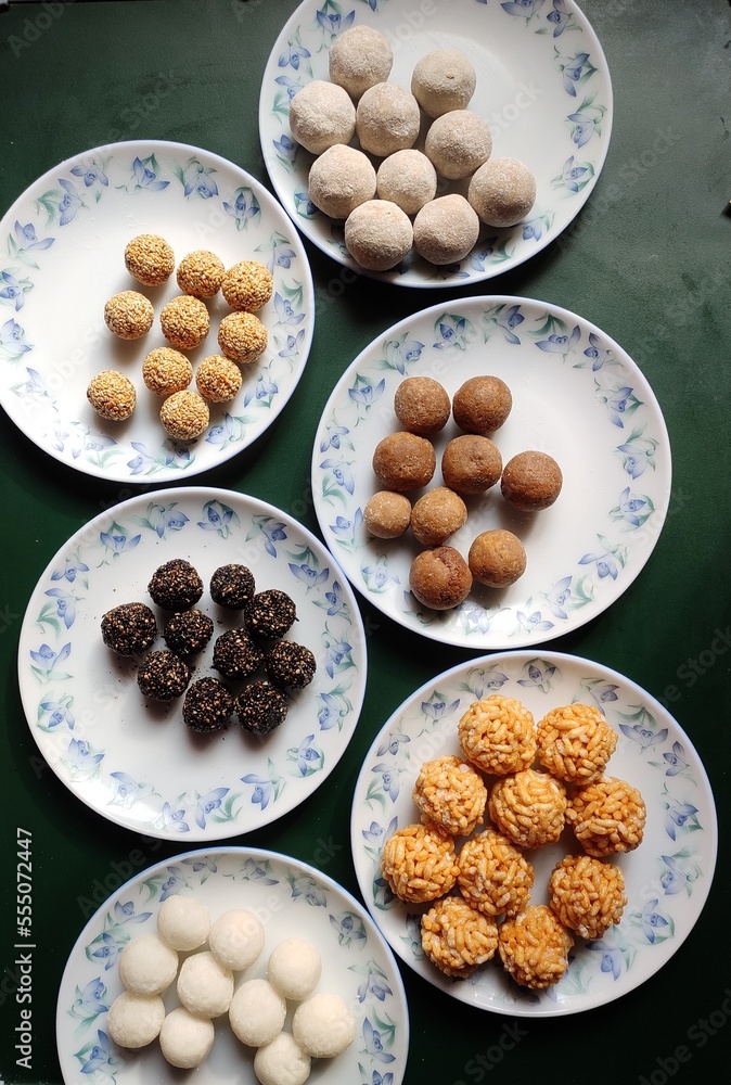 Round shaped desserts prepared by Assamese community in India called ...