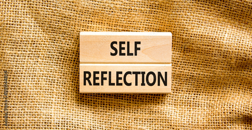 Self reflection symbol. Concept word Self reflection typed on wooden ...