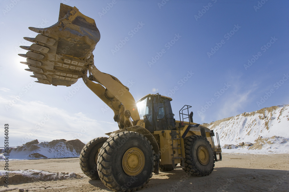 Low angle view of a front-end loader at a construction site Stock Photo ...