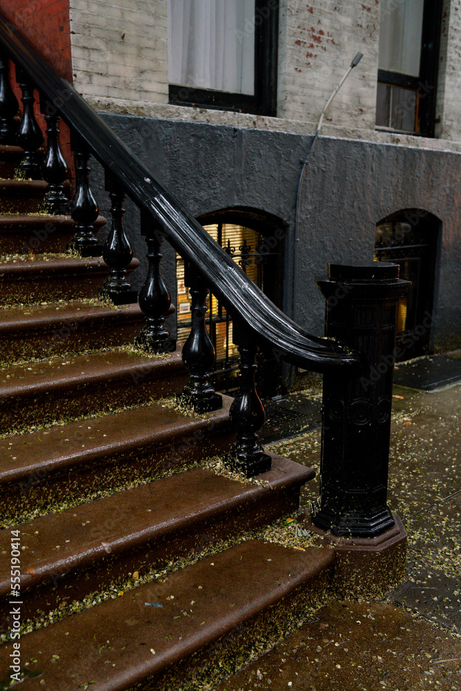 Brownstone house in New York. Typical exterior steps and doors on ...