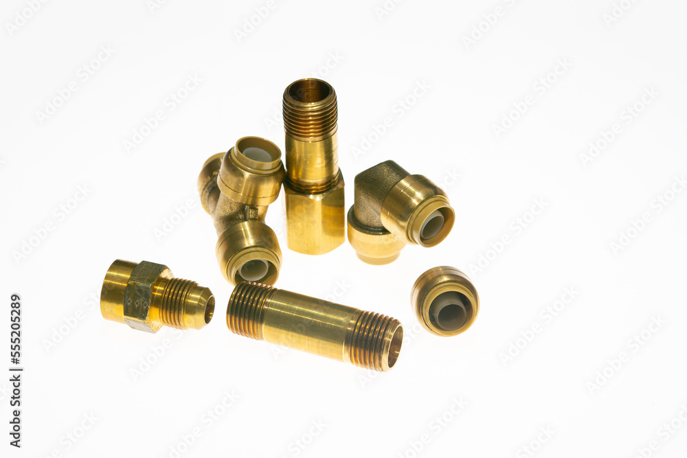 Brass plumbing fittings, pipes, elbows, and end caps, top and side ...