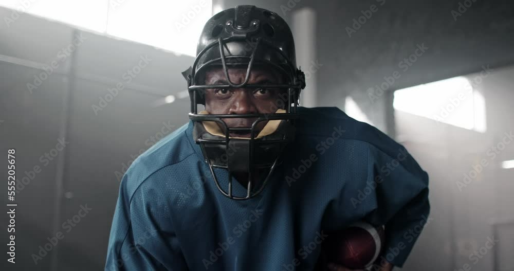 Close-up portrait of angry focused African man in helmet and uniform ...