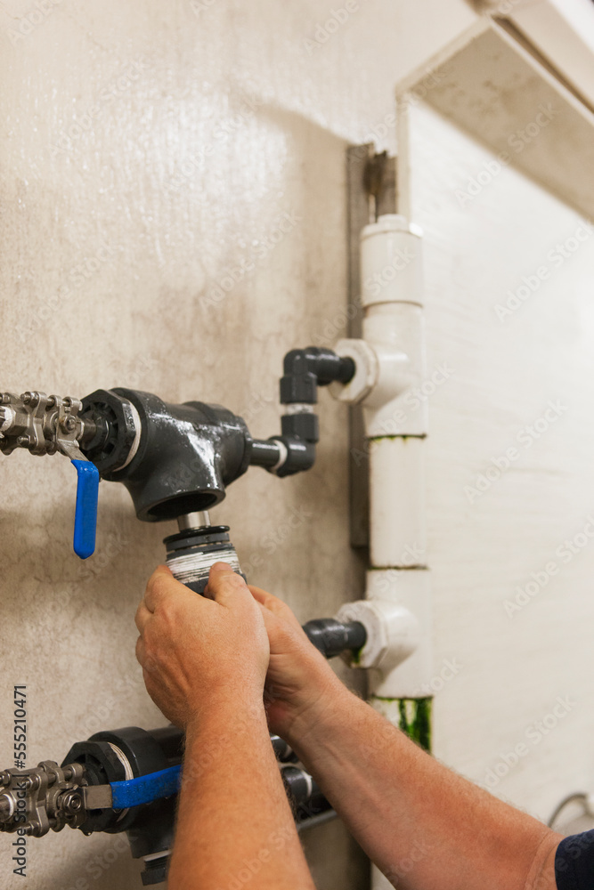 Engineer putting a rebuilt O2 electrochemical sensor probe into service ...