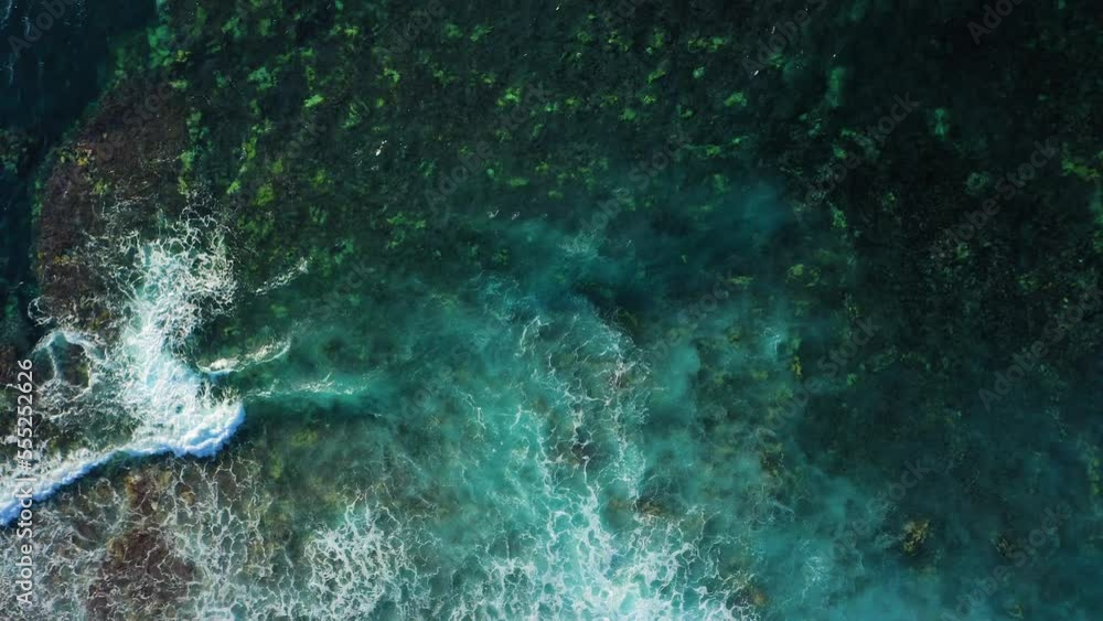 Ocean waters washing volcanic rocky rough beach, waves crashing on ...