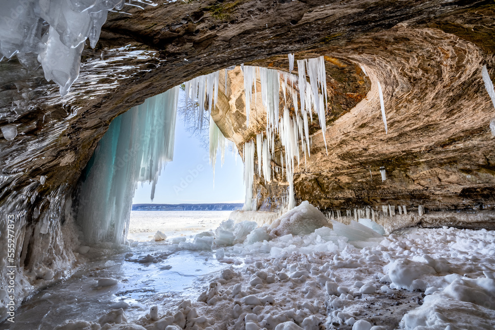 Lake Superior ice cave. These caves form during the extreme Upper Peninsula winters when water ...