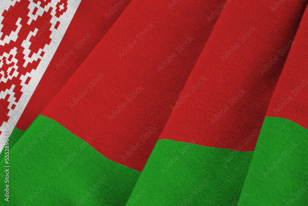 Belarus flag with big folds waving close up under the studio light ...
