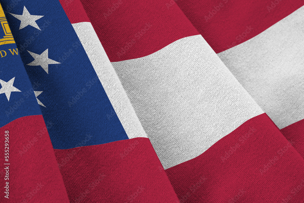 Georgia US state flag with big folds waving close up under the studio ...