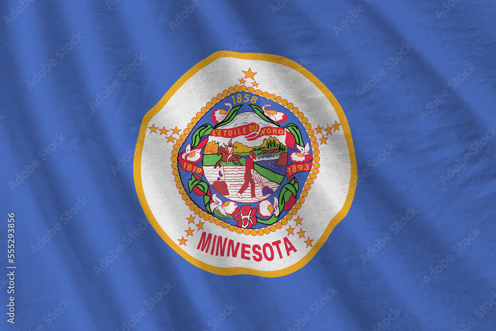 Minnesota US state flag with big folds waving close up under the studio ...