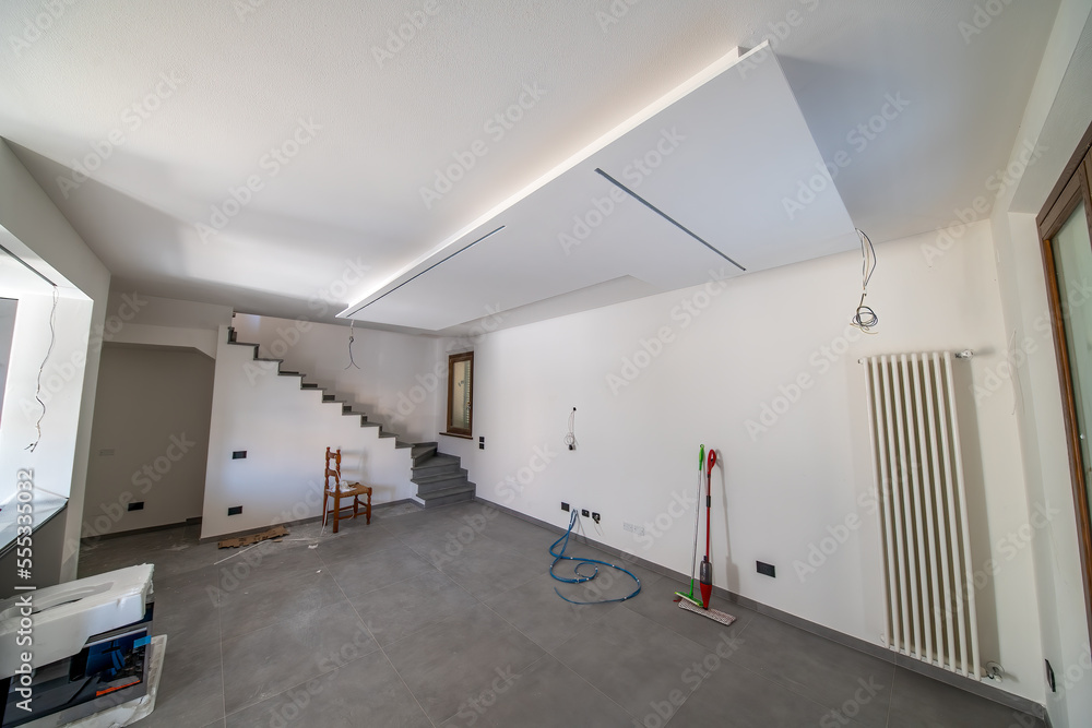 Drywall ceiling under construction, ready for led strips illumination ...