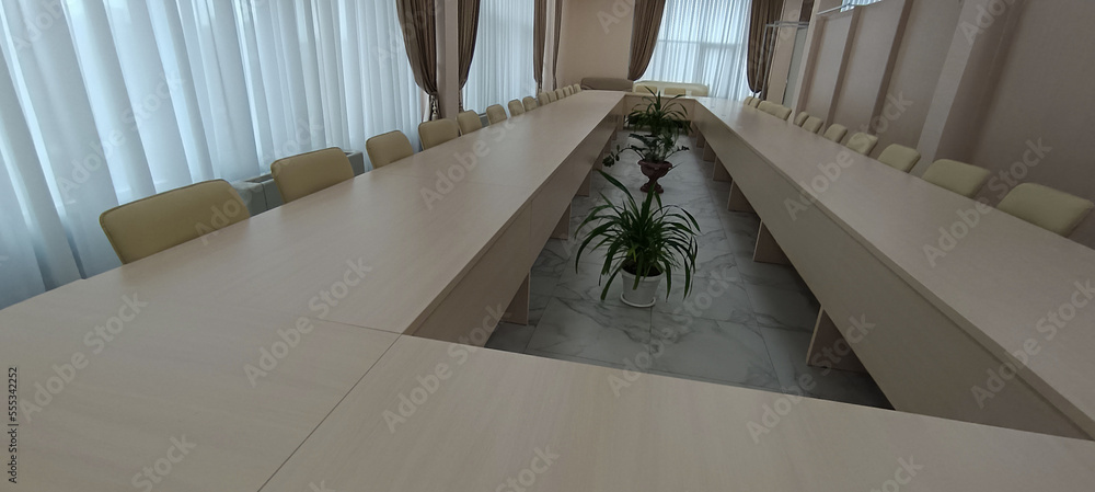 Loft meeting room interior, square table. Modern office conference room ...