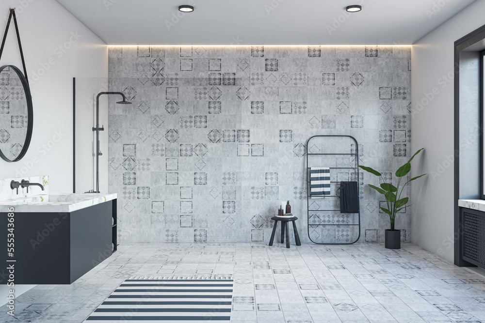 Spacious stylish bathroom with shower zone, dark furniture and window ...