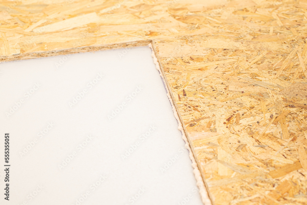 OSB plate on styrofoam on floor. Warming floor with styrofoam and wood ...