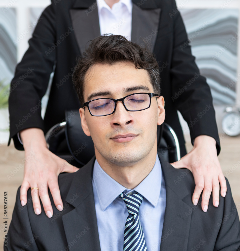 Young handsome man feeling good because of his female boss ...