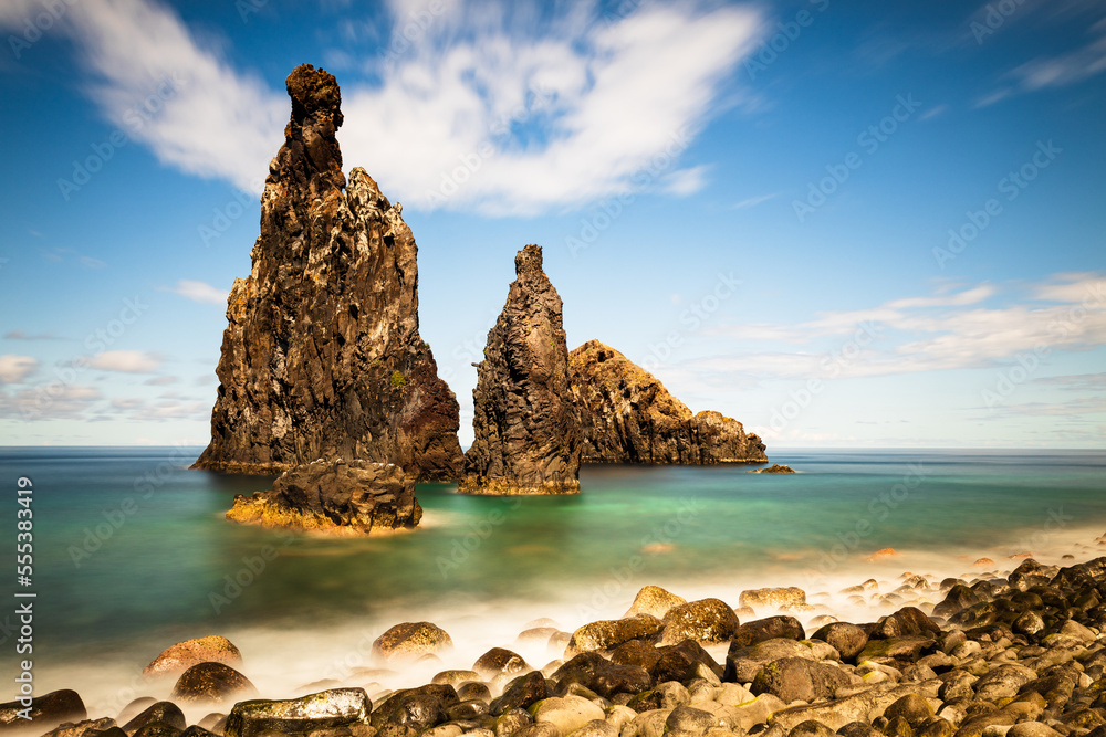 lava rocks in the Atlantic Ocean, island towers in Ribeira da Janela ...