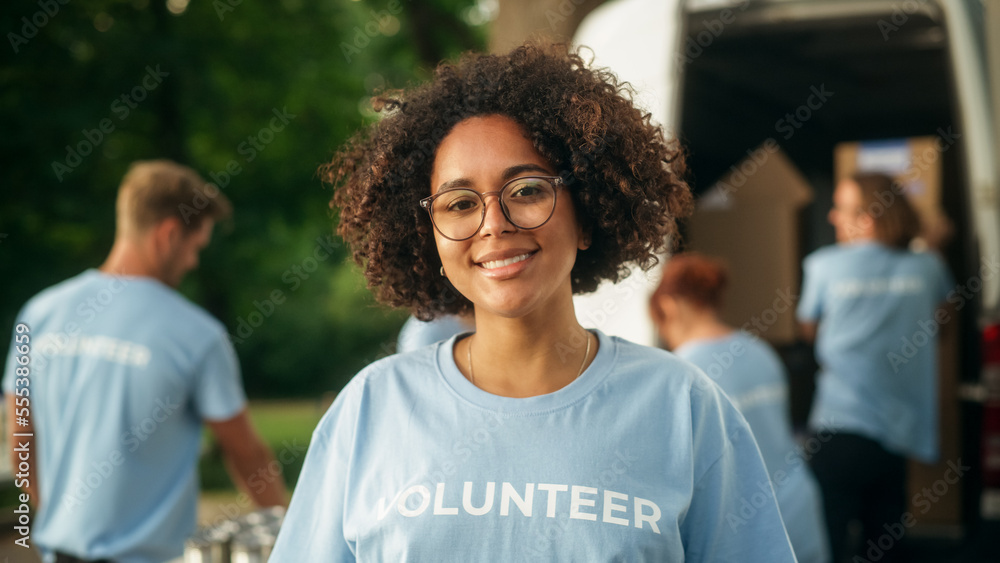 Portrait of a Happy Helpful Black Female Volunteer. Young Adult ...