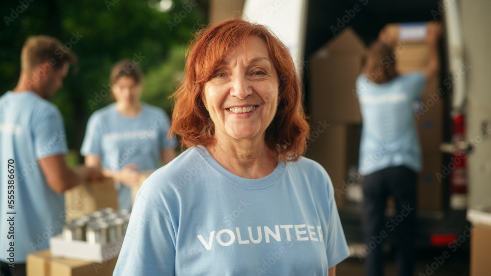 Portrait of a Happy Helpful Middle Aged Female Volunteer. Adult ...