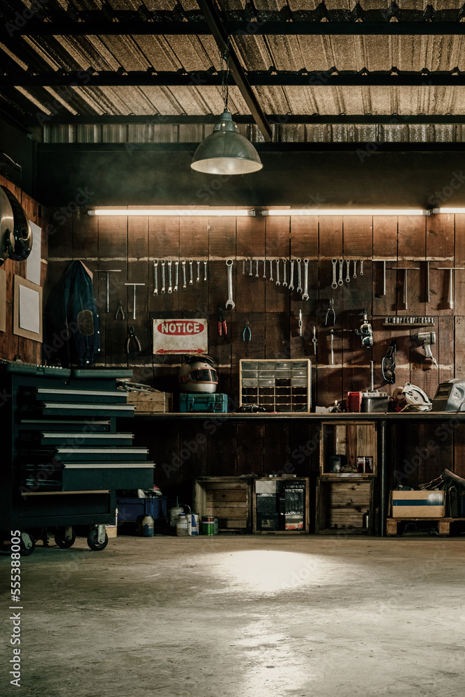 Workshop scene. Old tools hanging on wall in workshop, Tool shelf ...