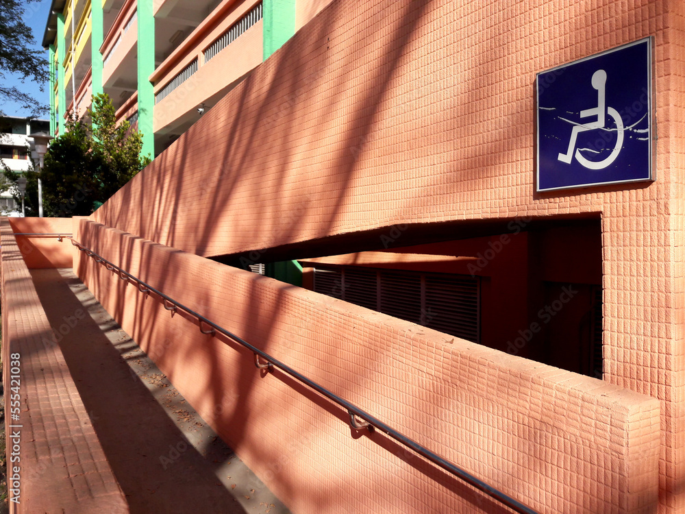 A wheelchair ramp, an inclined plane installed in addition to or ...