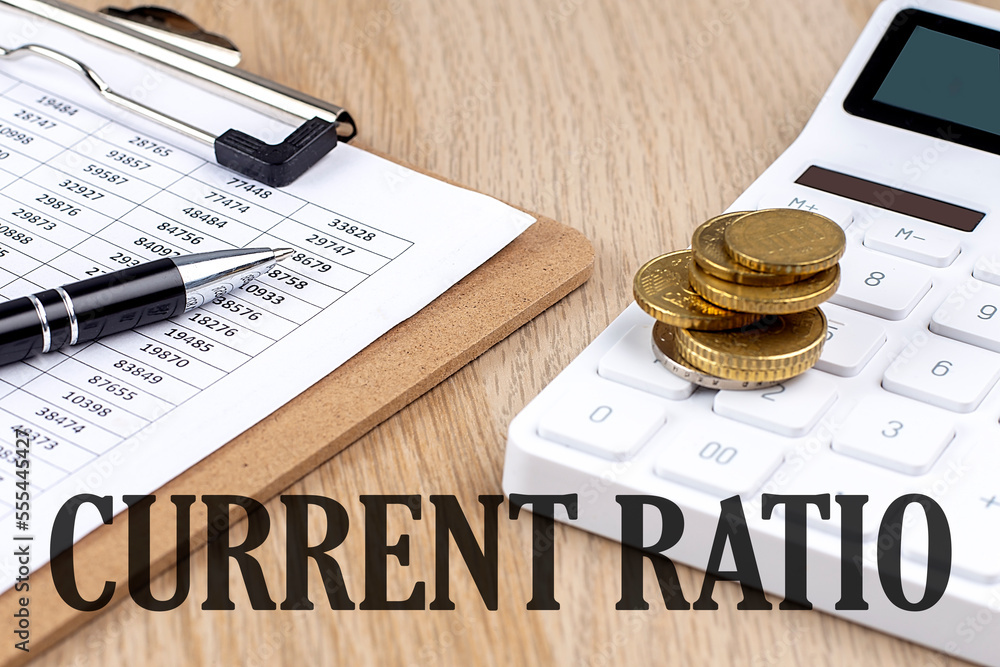 CURRENT RATIO text with chart and calculator and coins , business ...