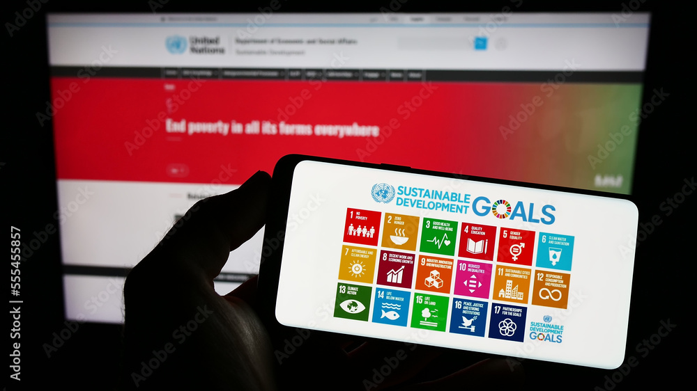 Stuttgart, Germany - 12-19-2022: Person holding mobile phone with logo ...