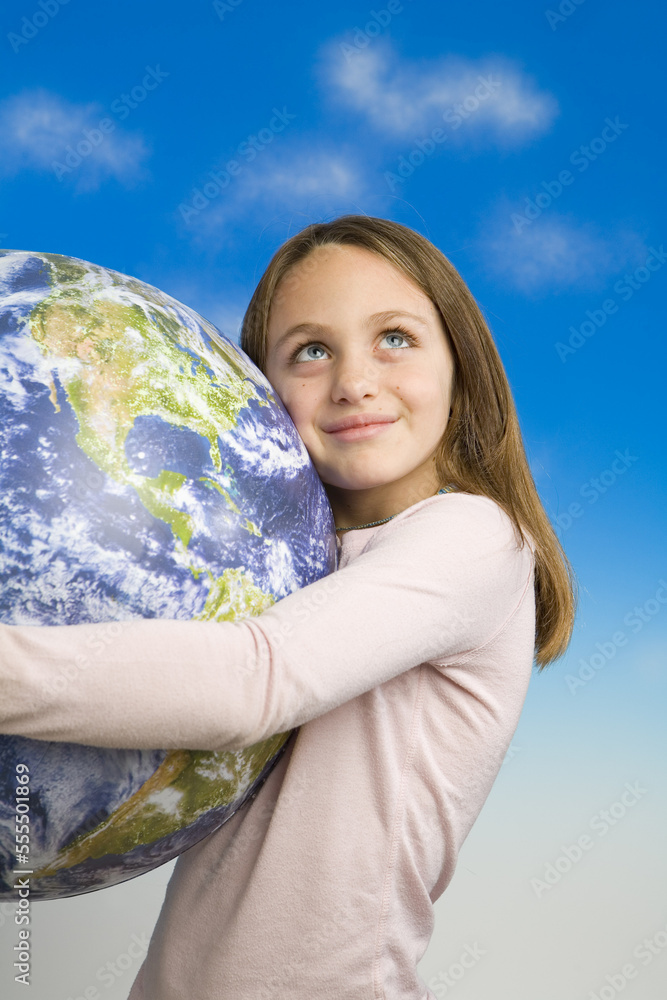 Little Girl Holding a Model of Earth as Seen From Outer Space Stock ...
