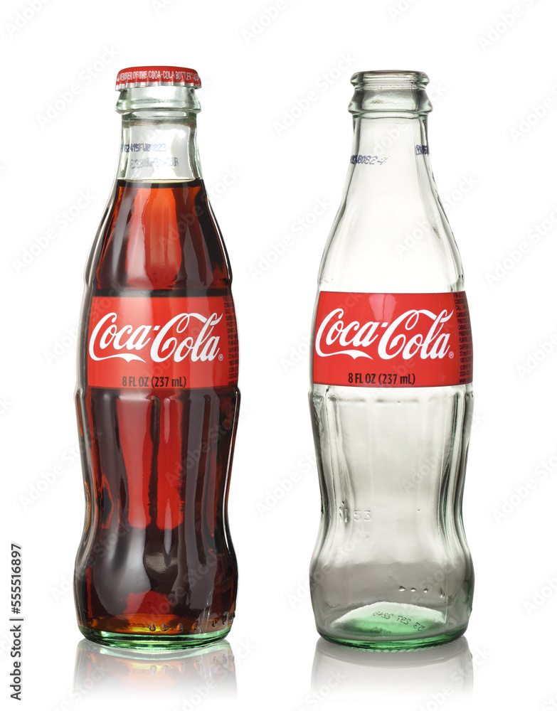Empty and full Coca Cola glass bottles Stock Photo | Adobe Stock Empty and full Coca Cola glass bottles Stock Photo | Adobe Stock