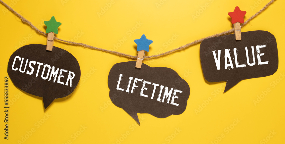 Hand writing Customer Lifetime Value with marker, concept background ...