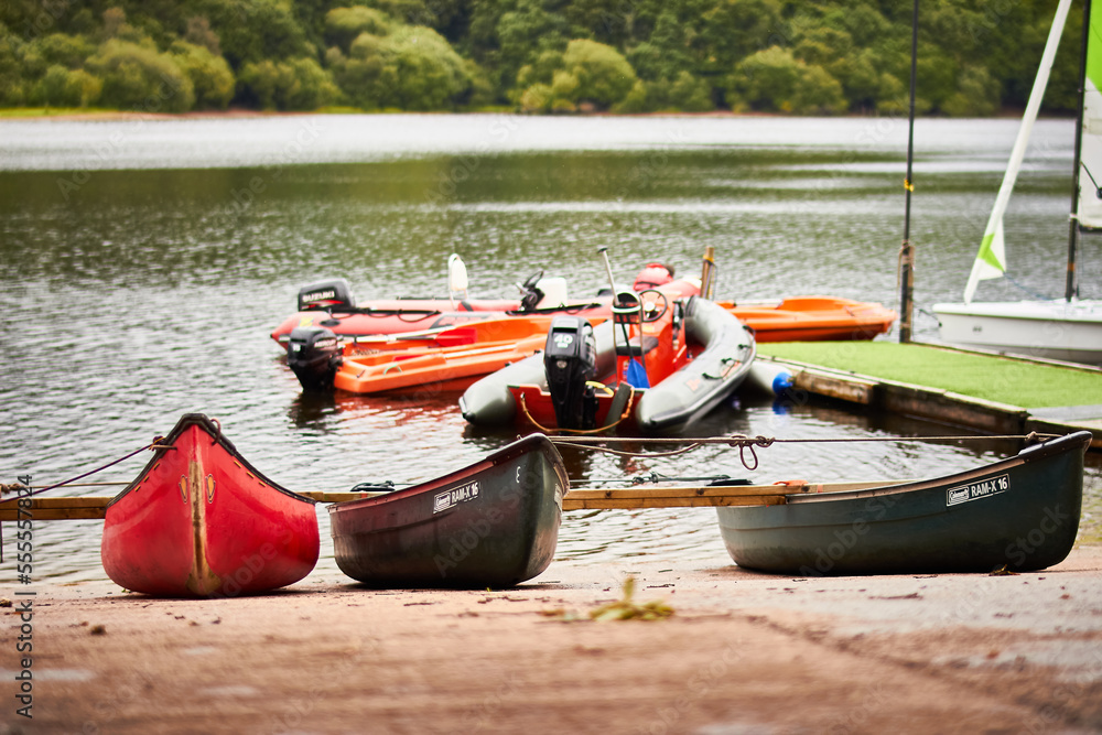 Multiple types of boats moored on the jetty and slipway at the Anderton ...
