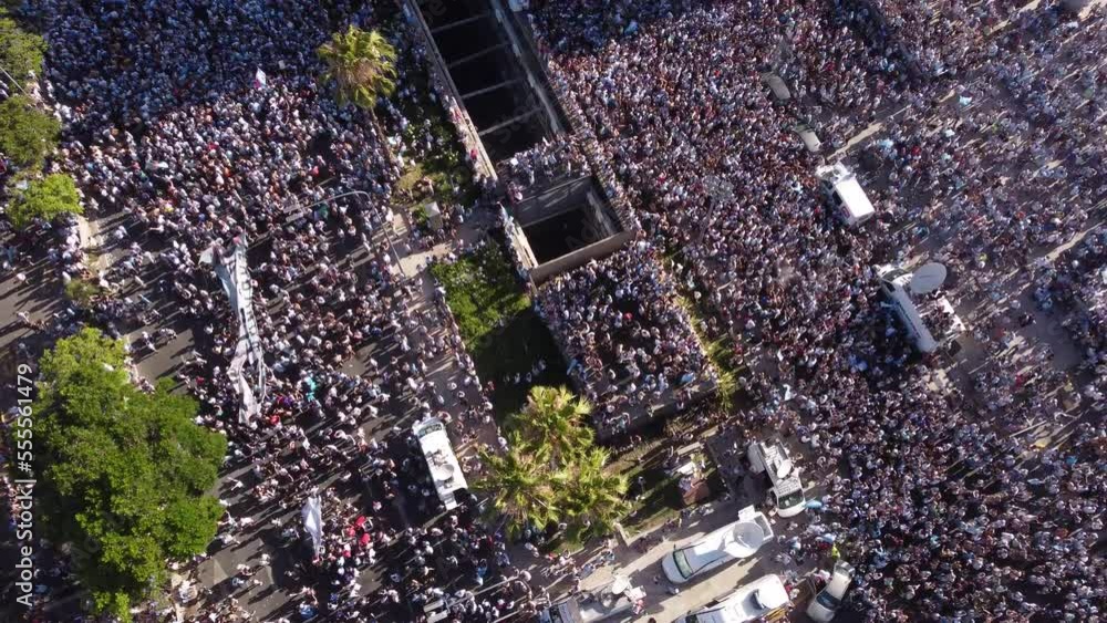 Aerial top down: Crowd of Argentinian People celebrating win of Soccer ...