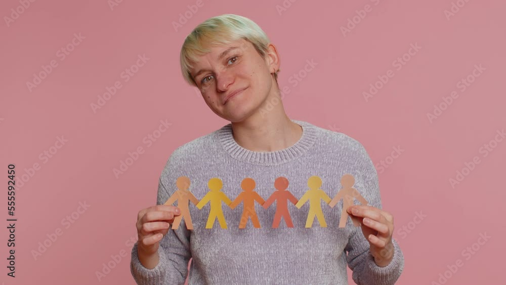 Woman showing multiracial different skin color human shape cut out of ...