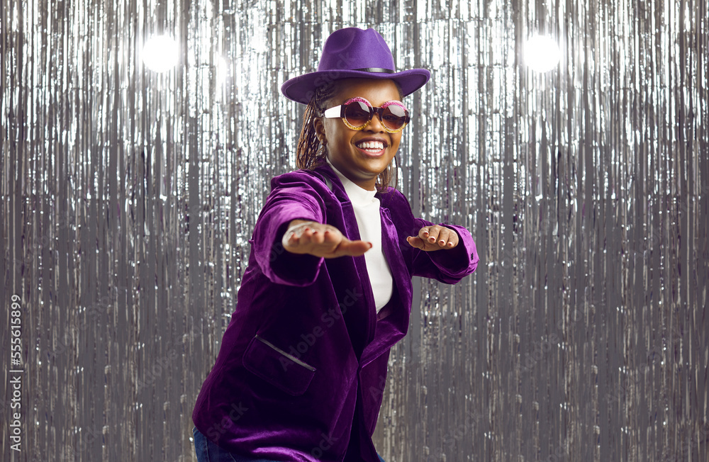 Happy beautiful Black woman having fun at cool disco party. Young ...