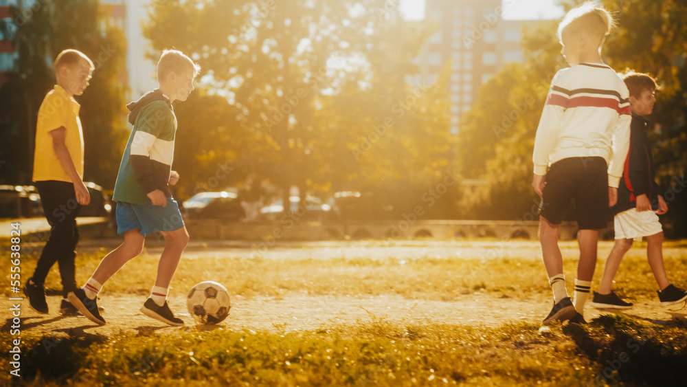 Talented Multiethnic Diverse Kids Playing Soccer in Their Backyard on a ...
