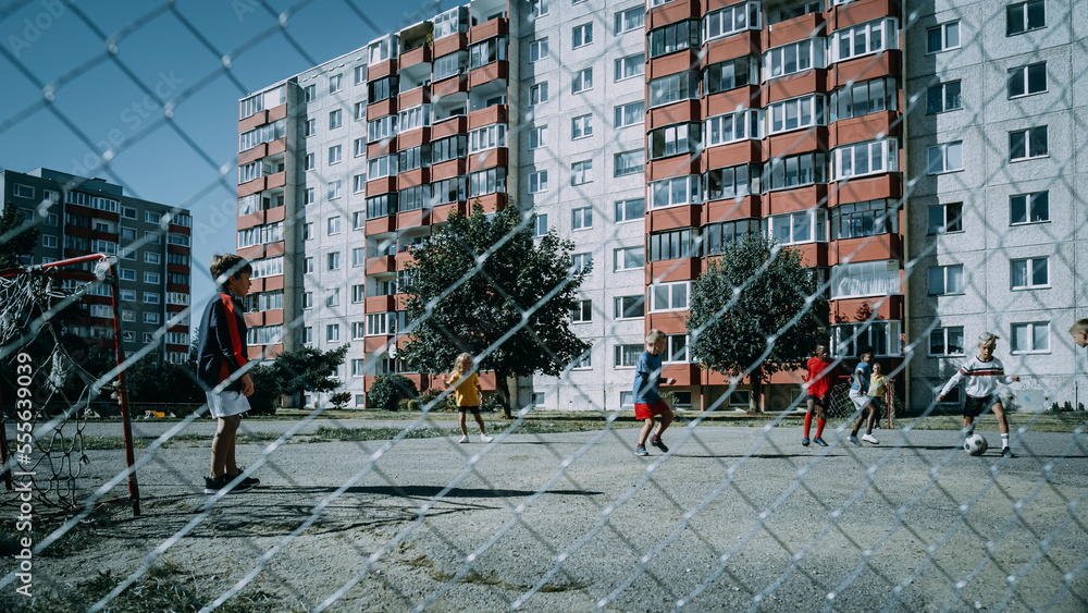 Neighborhood Kids Playing Soccer Outside in Urban Backyard. Young ...