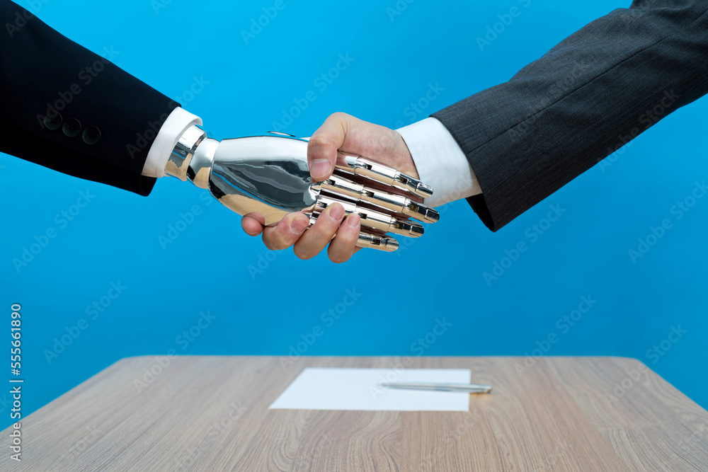 Human hand handshake with robot hand Stock Photo | Adobe Stock