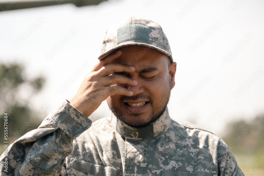 Stressed depressed crying lose war Asian man special forces soldier ...