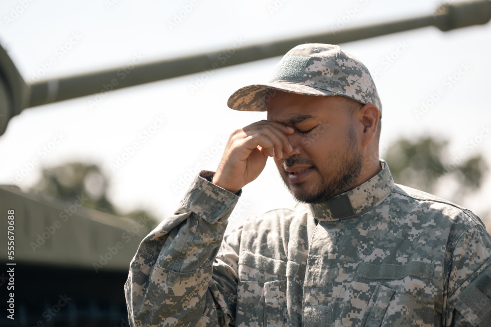 Stressed depressed crying lose war Asian man special forces soldier ...