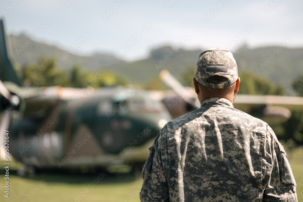 Asian man special forces soldier standing against on the field Mission ...