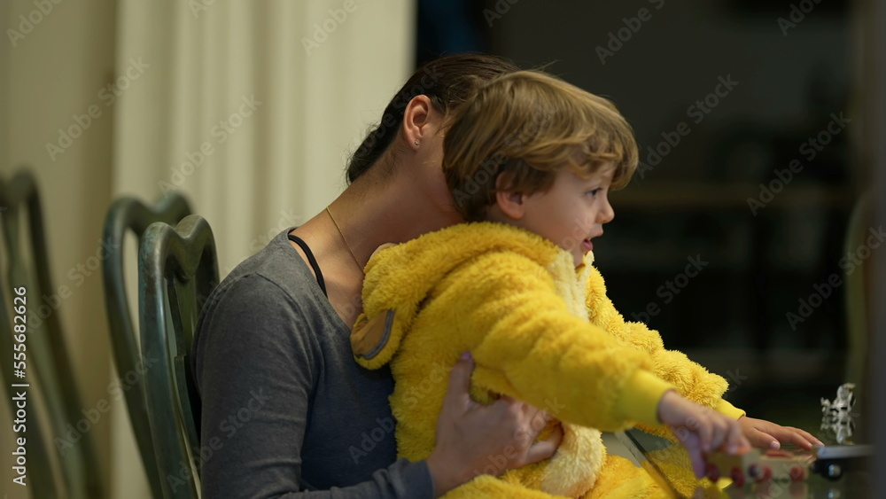 Candid mother holding small boy child. Authentic real life mom ...