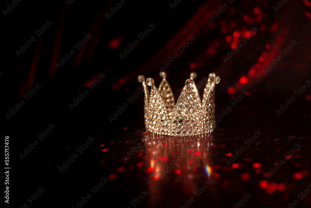 Royal crown on luxury satin, silk fabric background Stock Photo | Adobe ...