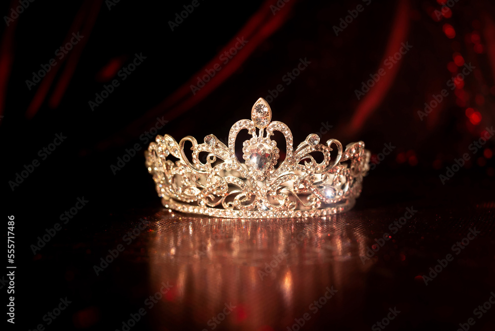 Royal crown on luxury satin, silk fabric background Stock Photo | Adobe ...