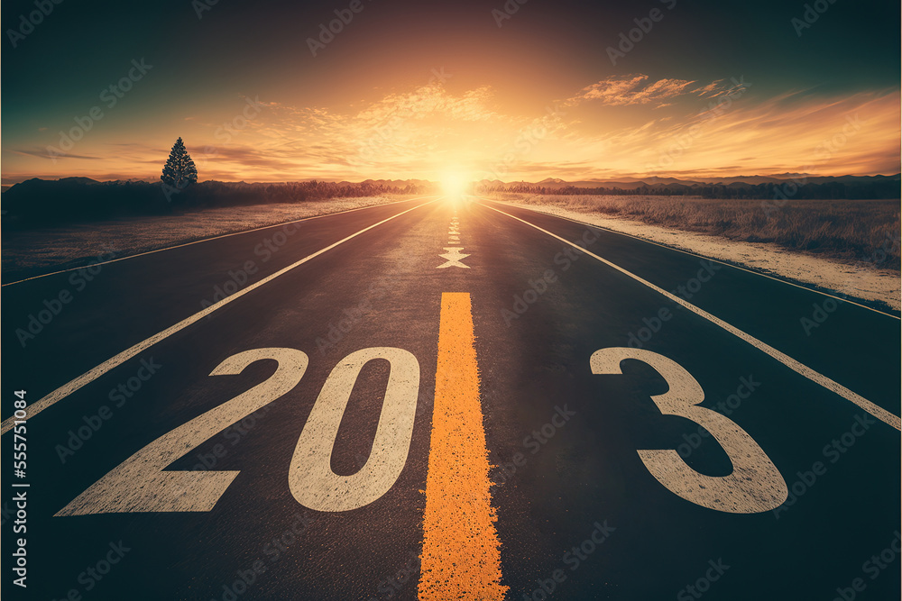New year 2023 or start straight concept.Text 2023 written on the road ...